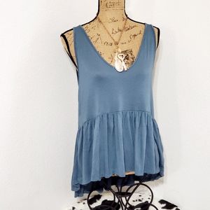 Raggs to Riches | Tops | Rags To Richesvneck Sleeveless Swing Topmed ...